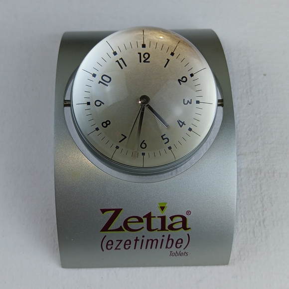Source Unknown | Accents | Zetia Pharmaceutical Spinning Clock With ...
